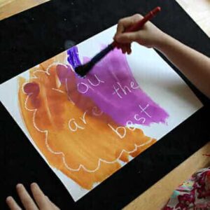 Invisible Ink Ghosts with Crayon Resist Painting - The Artful Parent
