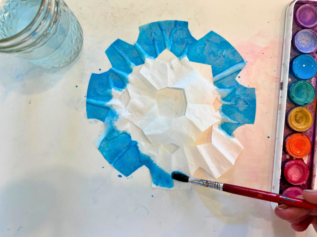 How To Make Paper Snowflakes with Coffee Filters